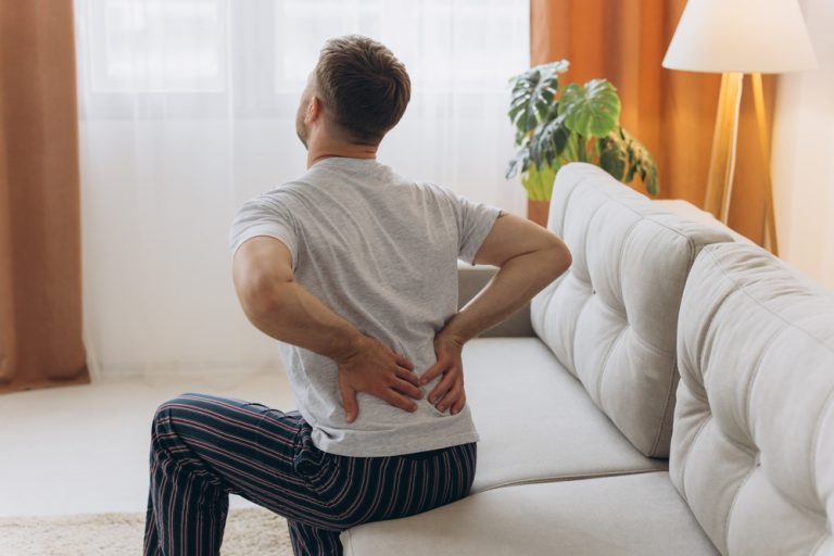 Middle Back Pain Around the Rib Cage: Causes & Treatments